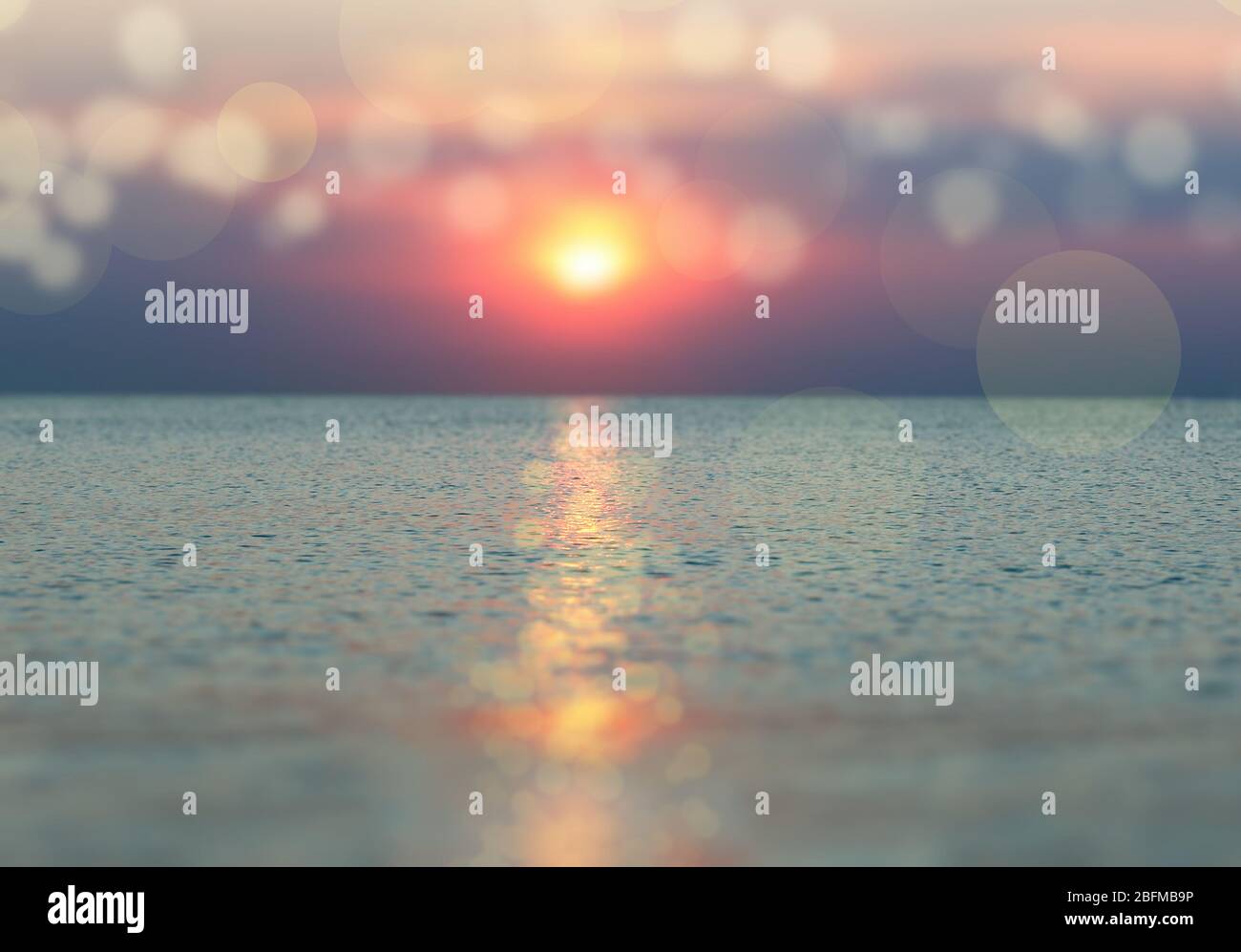 View of beautiful sunrise on the beach Stock Photo - Alamy