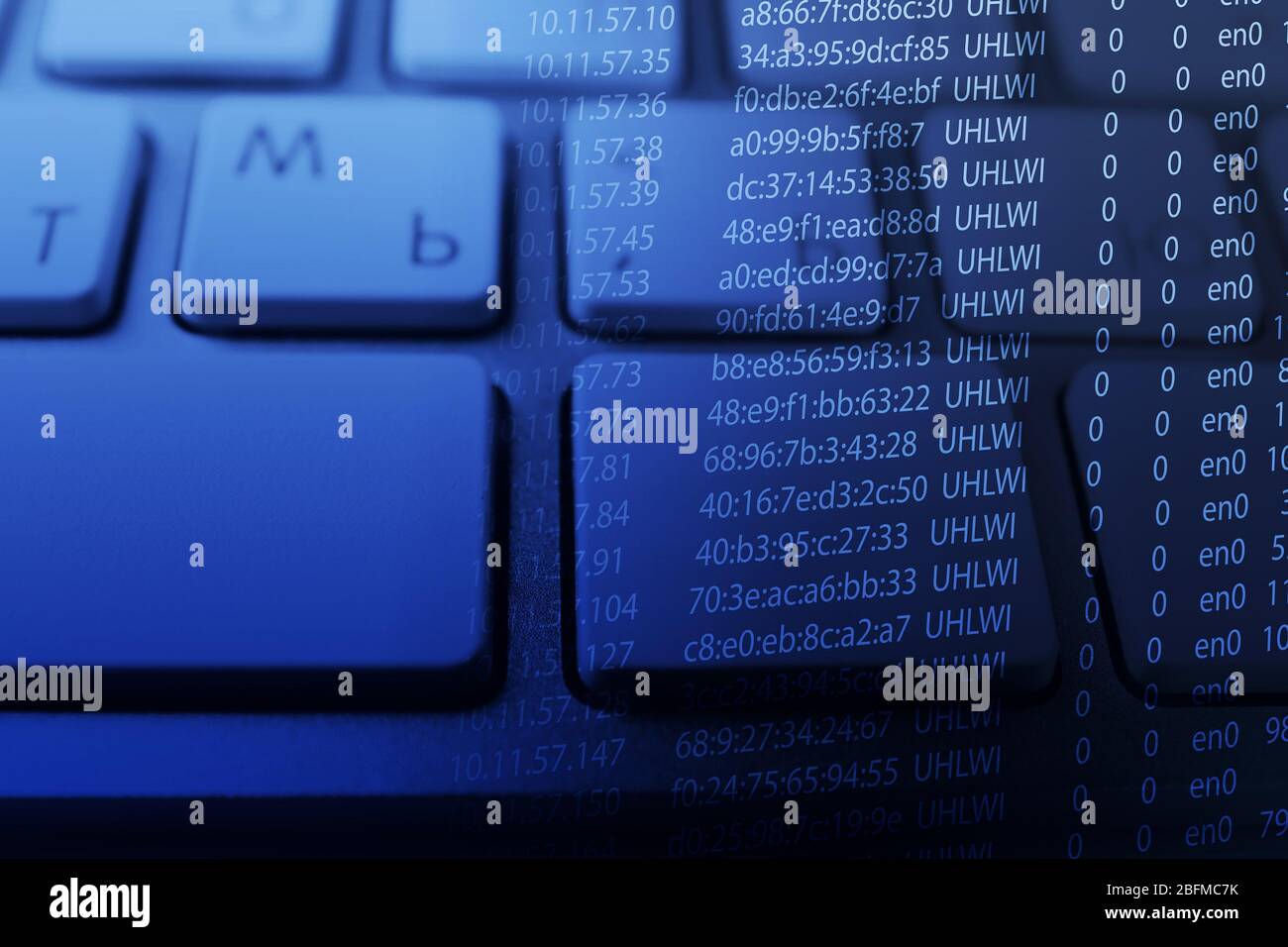 Computer keyboard with program code Stock Photo - Alamy