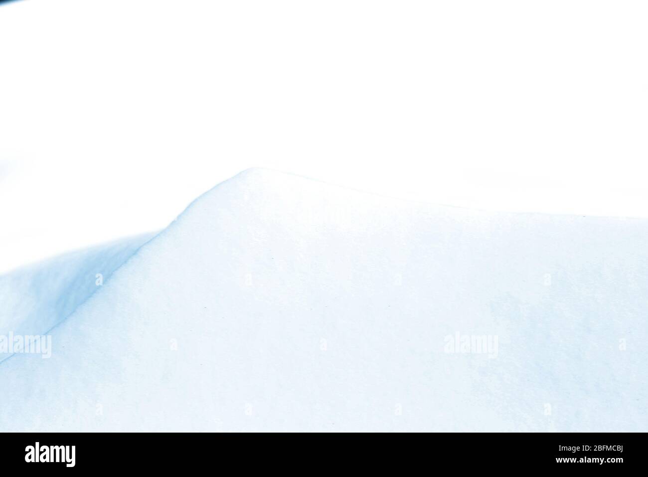 Beautiful natural snowdrift with white background Stock Photo - Alamy