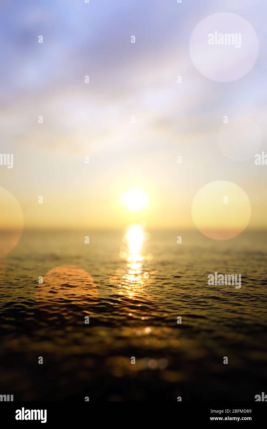 View of beautiful sunrise on the beach Stock Photo - Alamy