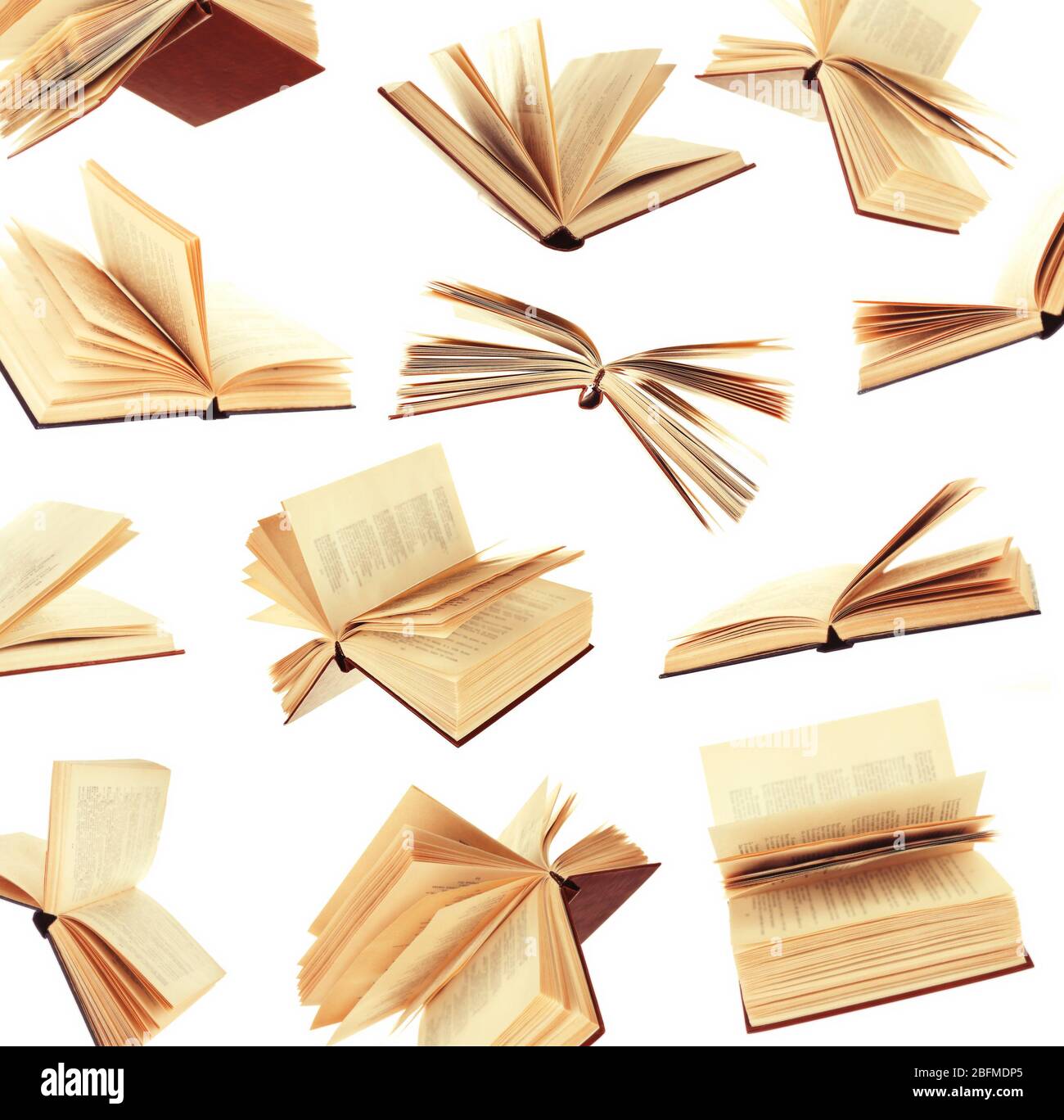 Many flying books as background isolated on white Stock Photo - Alamy