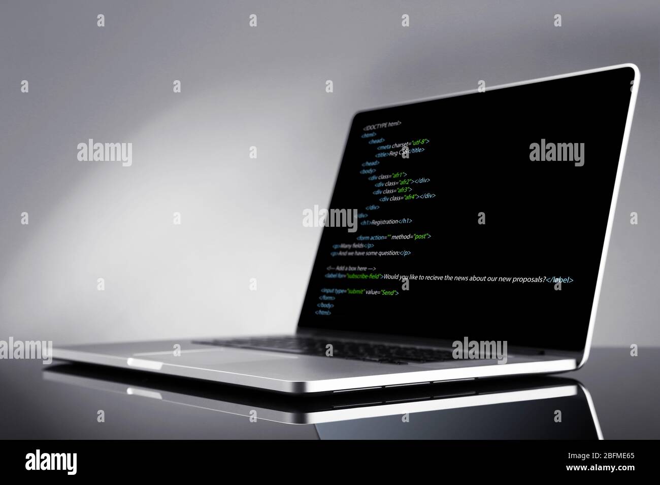 Programming code on laptop monitor Stock Photo - Alamy