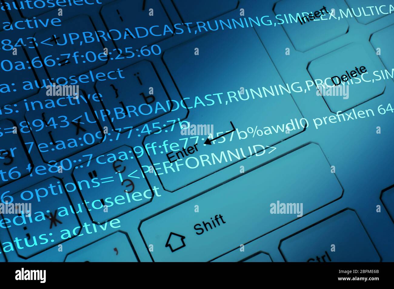 Computer keyboard with program code Stock Photo - Alamy