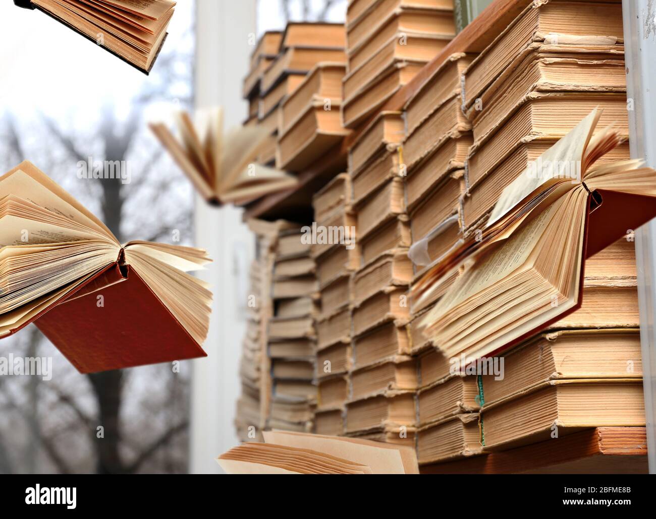 Flying books bookshelf hi-res stock photography and images - Alamy