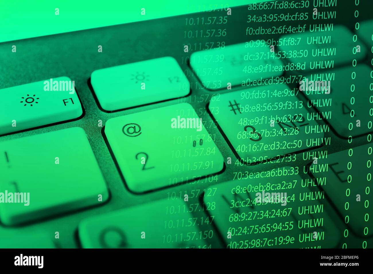 Computer keyboard with program code Stock Photo - Alamy