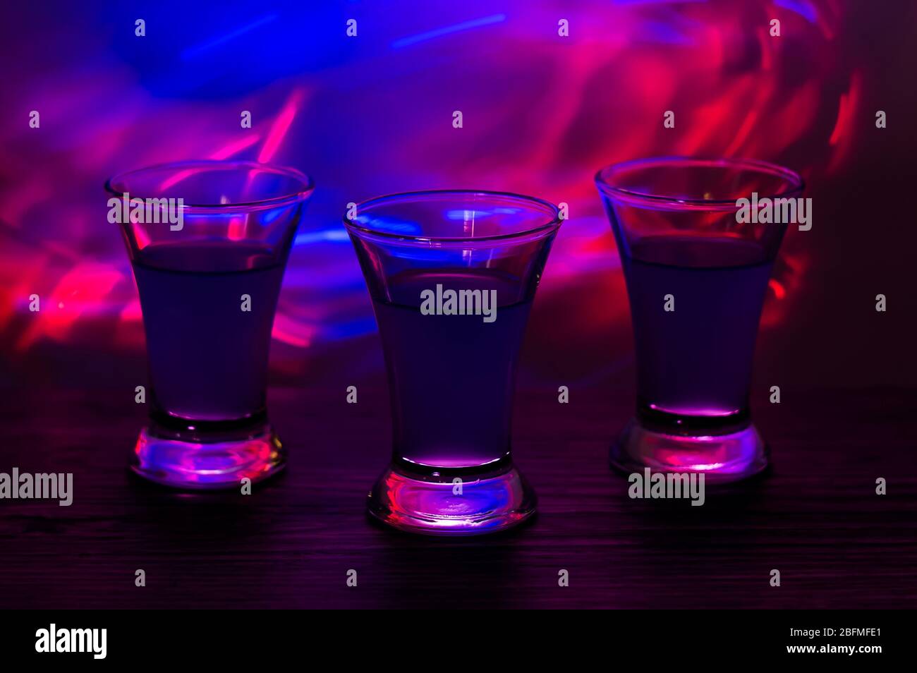 Three drinks at the party. Three shots with cocktails at the bar ...