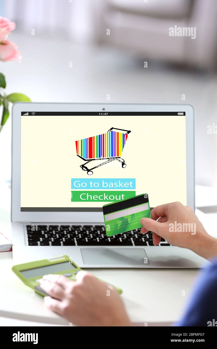 Online shopping. Female making online payment, close up Stock Photo - Alamy