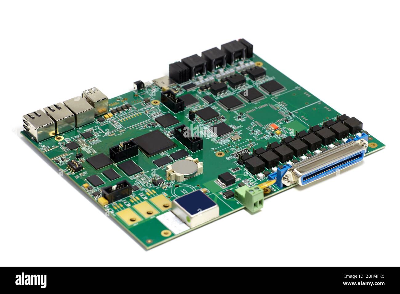 Electronic printed circuit board with chips and other components, green ...
