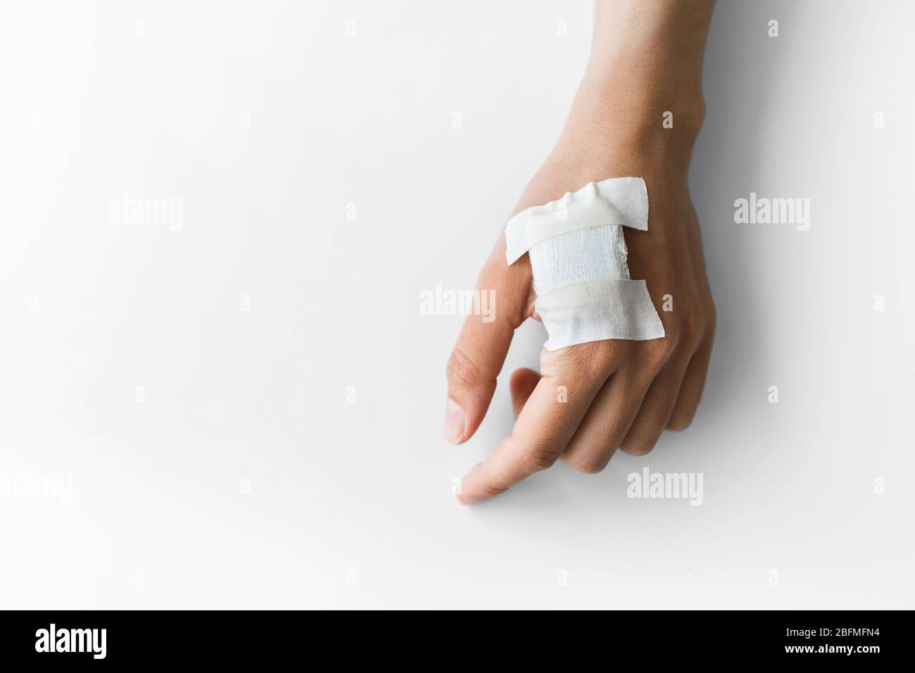Woman hand with plaster bandage after mandatory medical chipization in ...