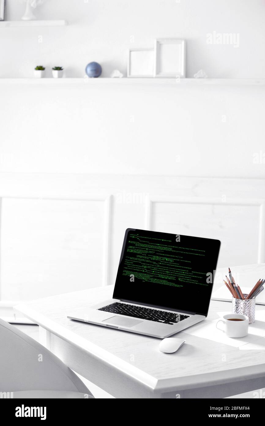 Programming code on laptop monitor Stock Photo - Alamy