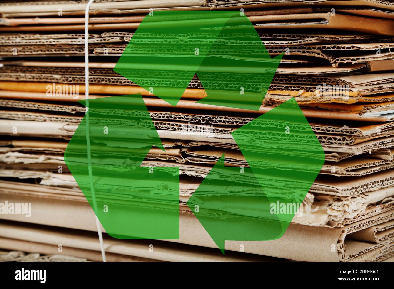 Big stack of papers and recycle sign Stock Photo - Alamy