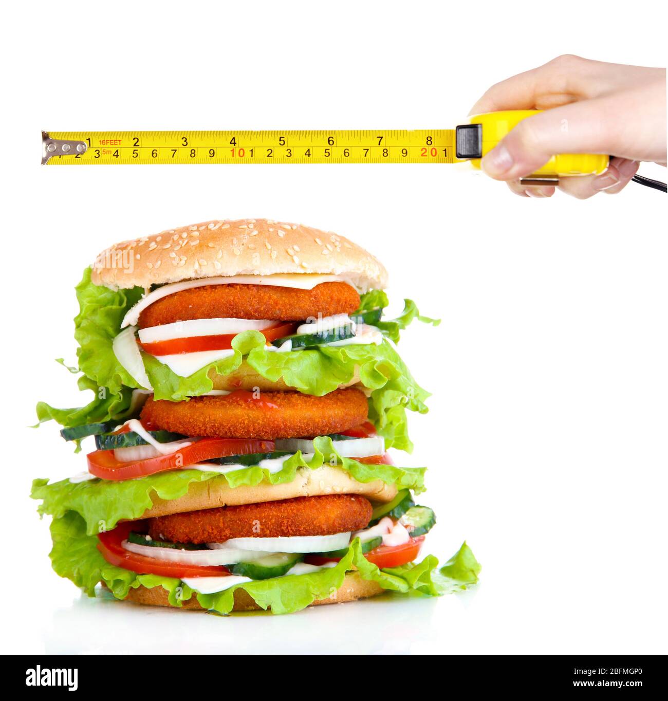 Huge burger and hand with roulette isolated on white Stock Photo - Alamy