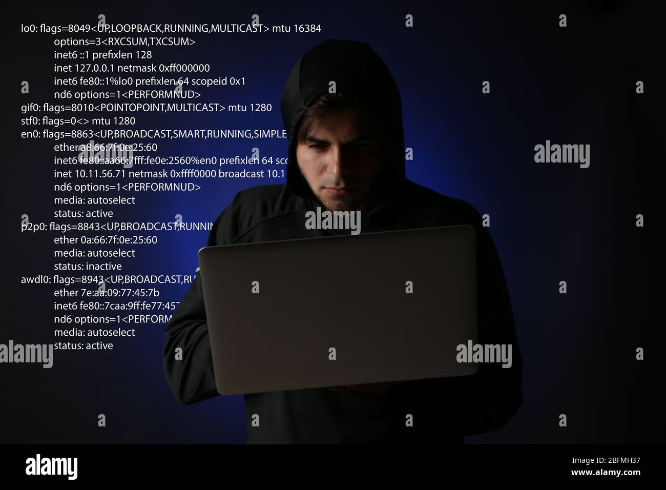 Hacker working with computer Stock Photo - Alamy