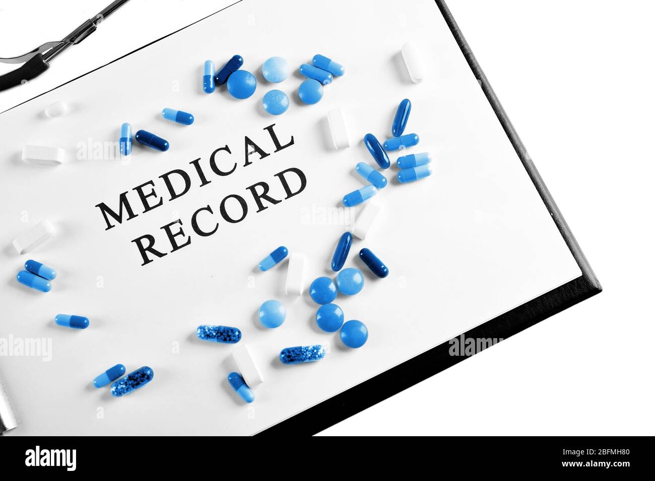 Medical record and pills close up Stock Photo - Alamy