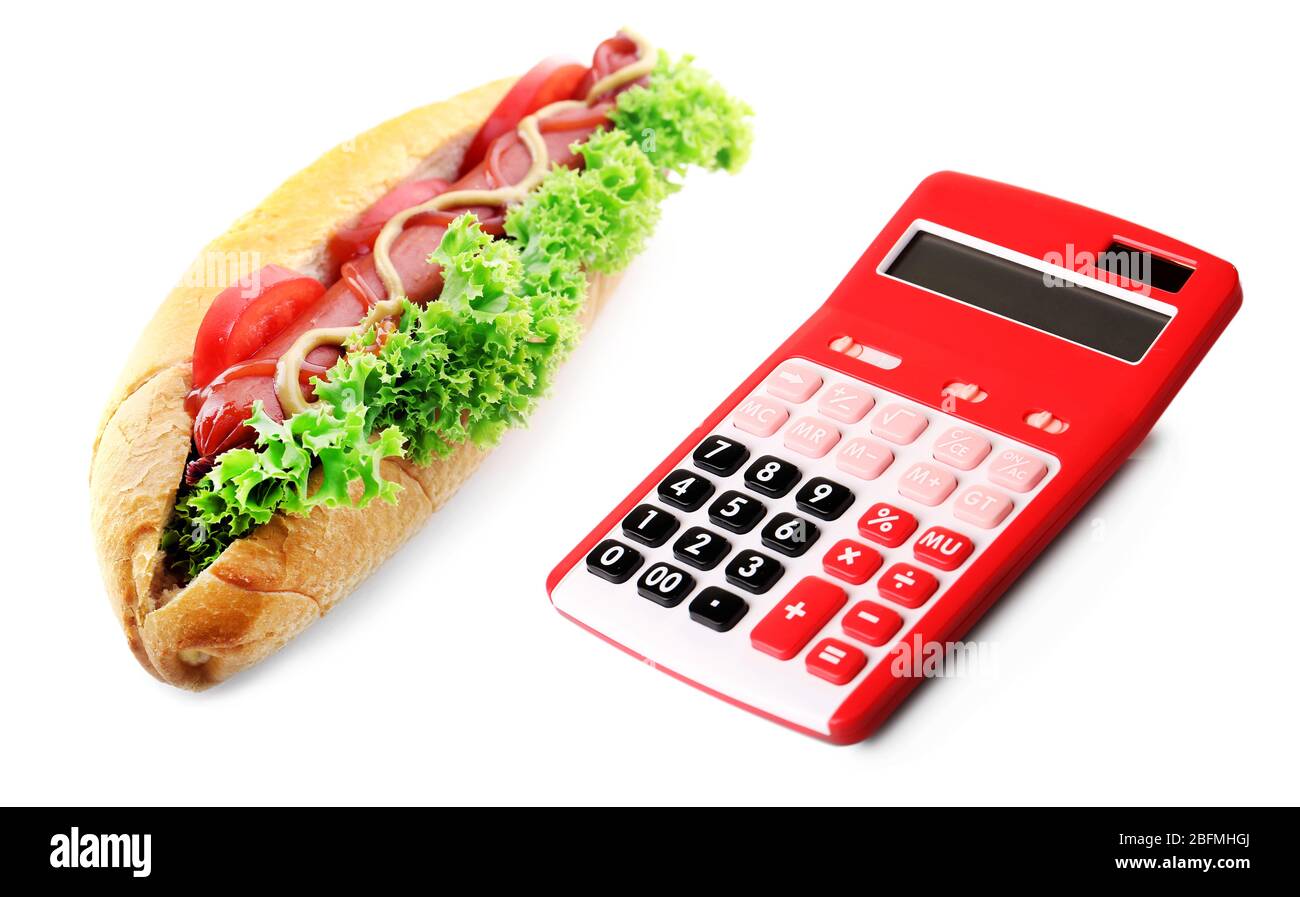 Calculator and tasty hot dog isolated on white Stock Photo - Alamy