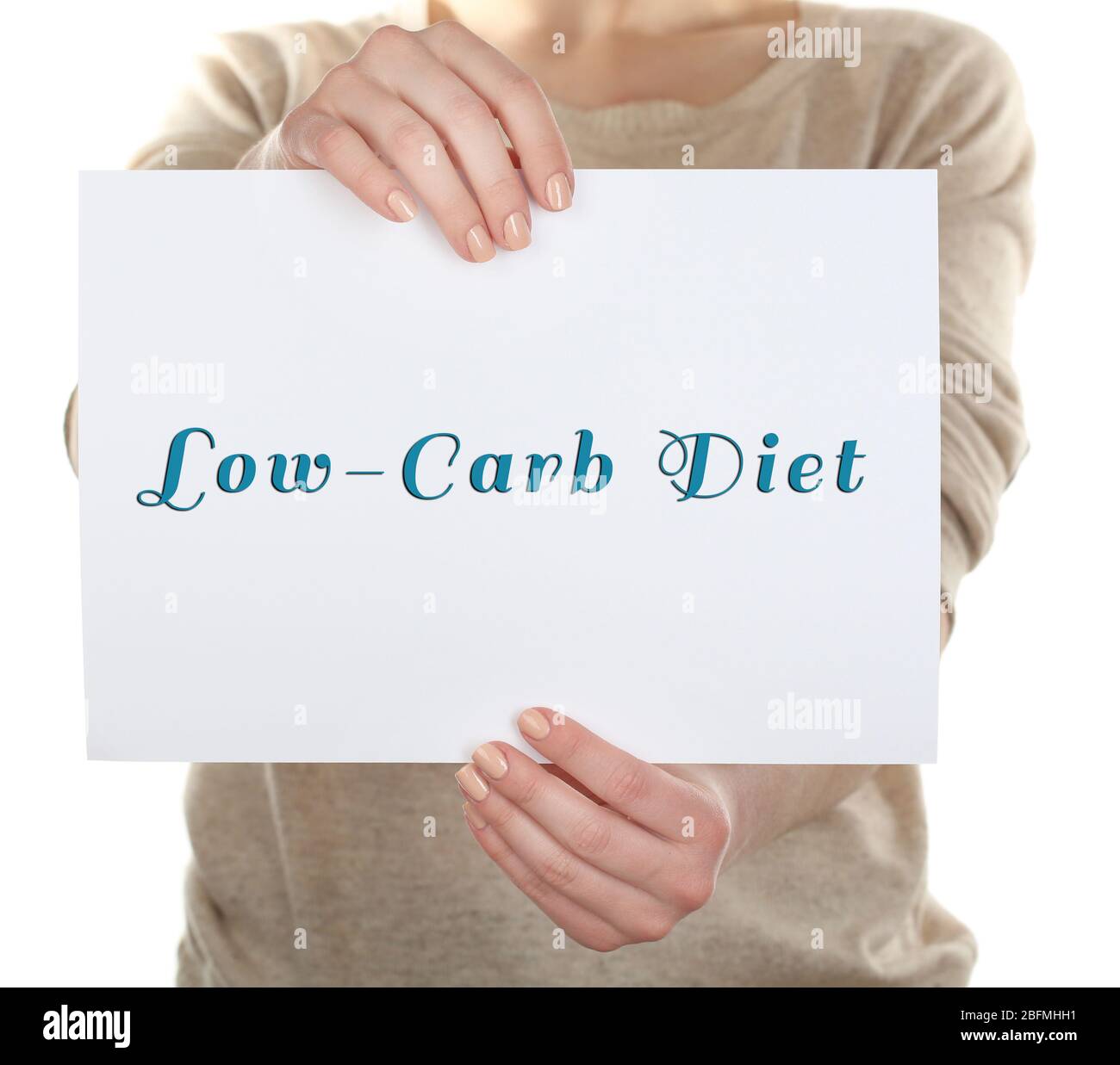 Woman holding card with text Low-Carb Diet, close-up Stock Photo - Alamy