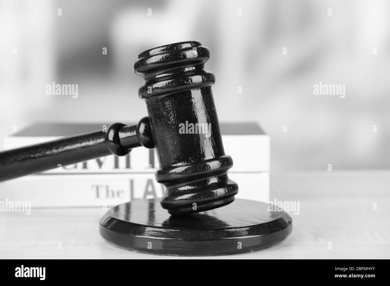 Wooden judges gavel on wooden table, close up. Retro stylization Stock ...