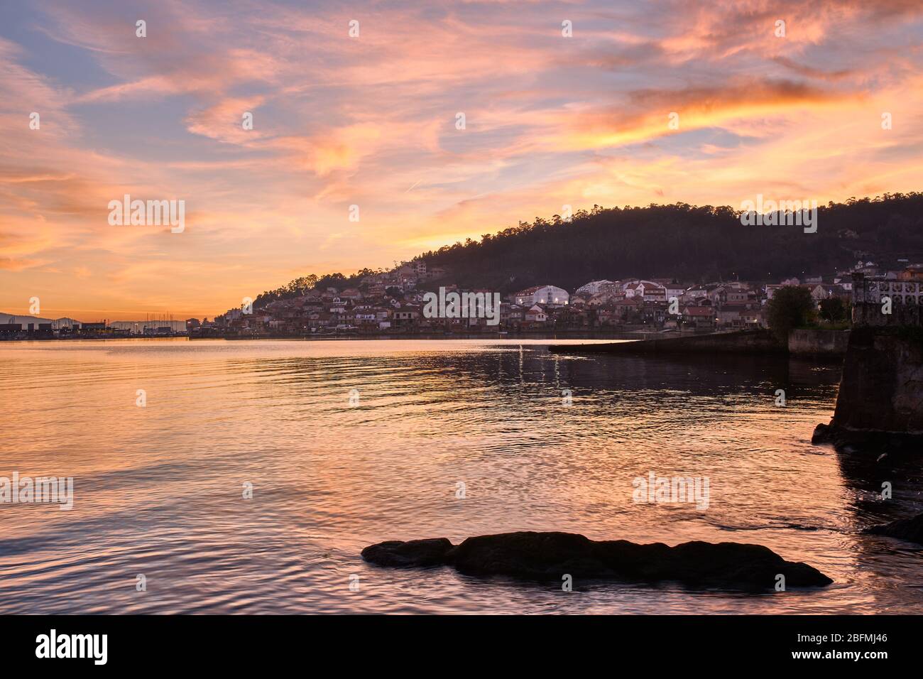 Sunset in the fishing village of Combarro in Galicia, Spain Stock Photo ...