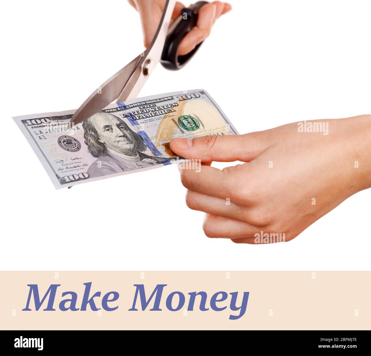 Hands with scissors cutting dollar banknote, isolated on white Stock ...