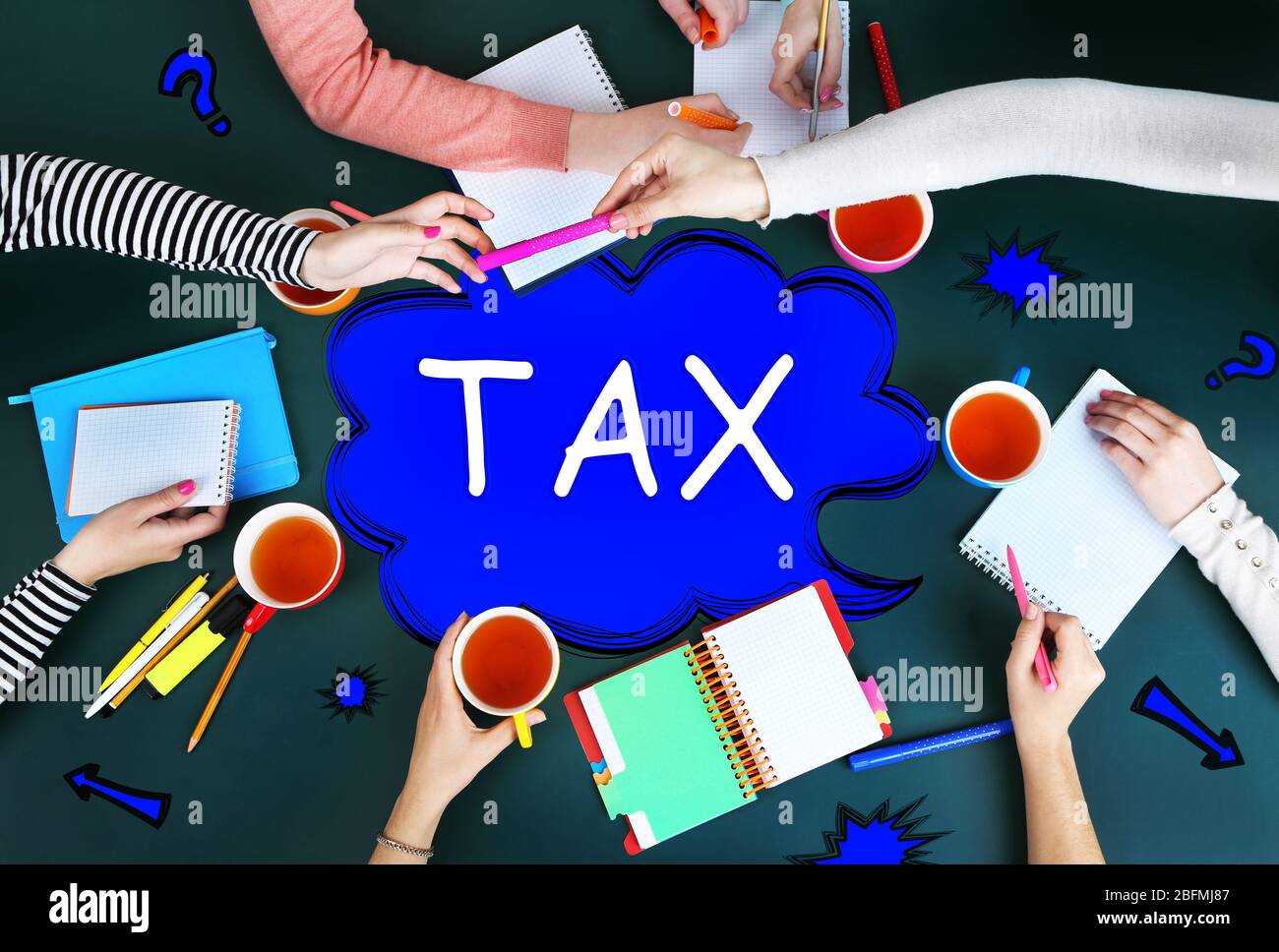 Tax concept. Creative team for work flow on blackboard background top ...