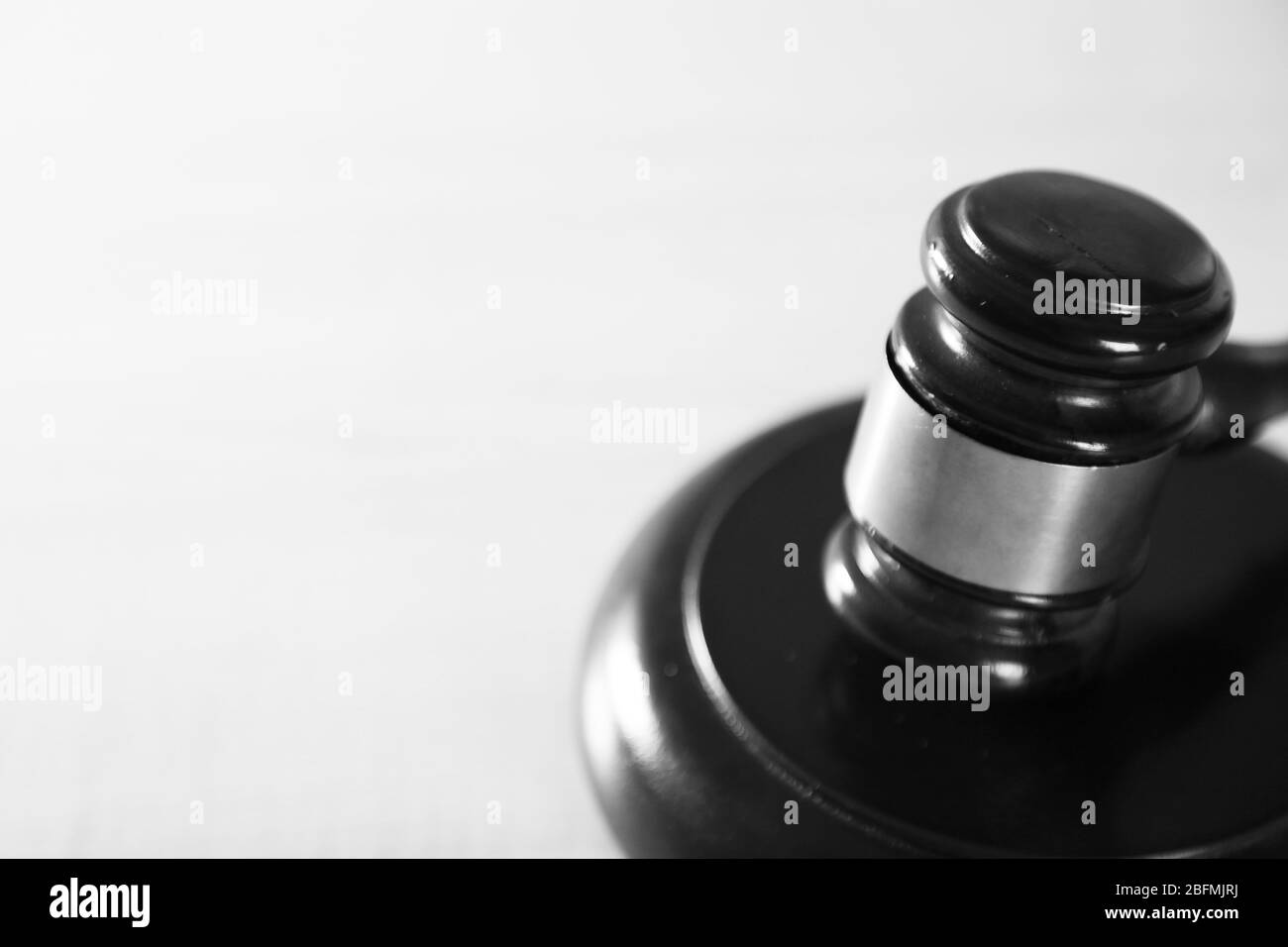 Wooden judges gavel on able, close up. Retro stylization Stock Photo ...