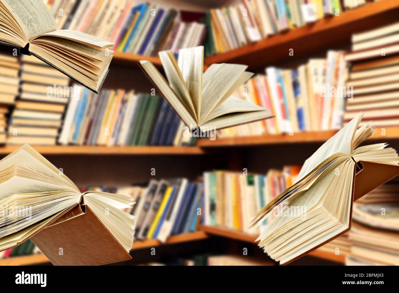 Flying books bookshelf hi-res stock photography and images - Alamy