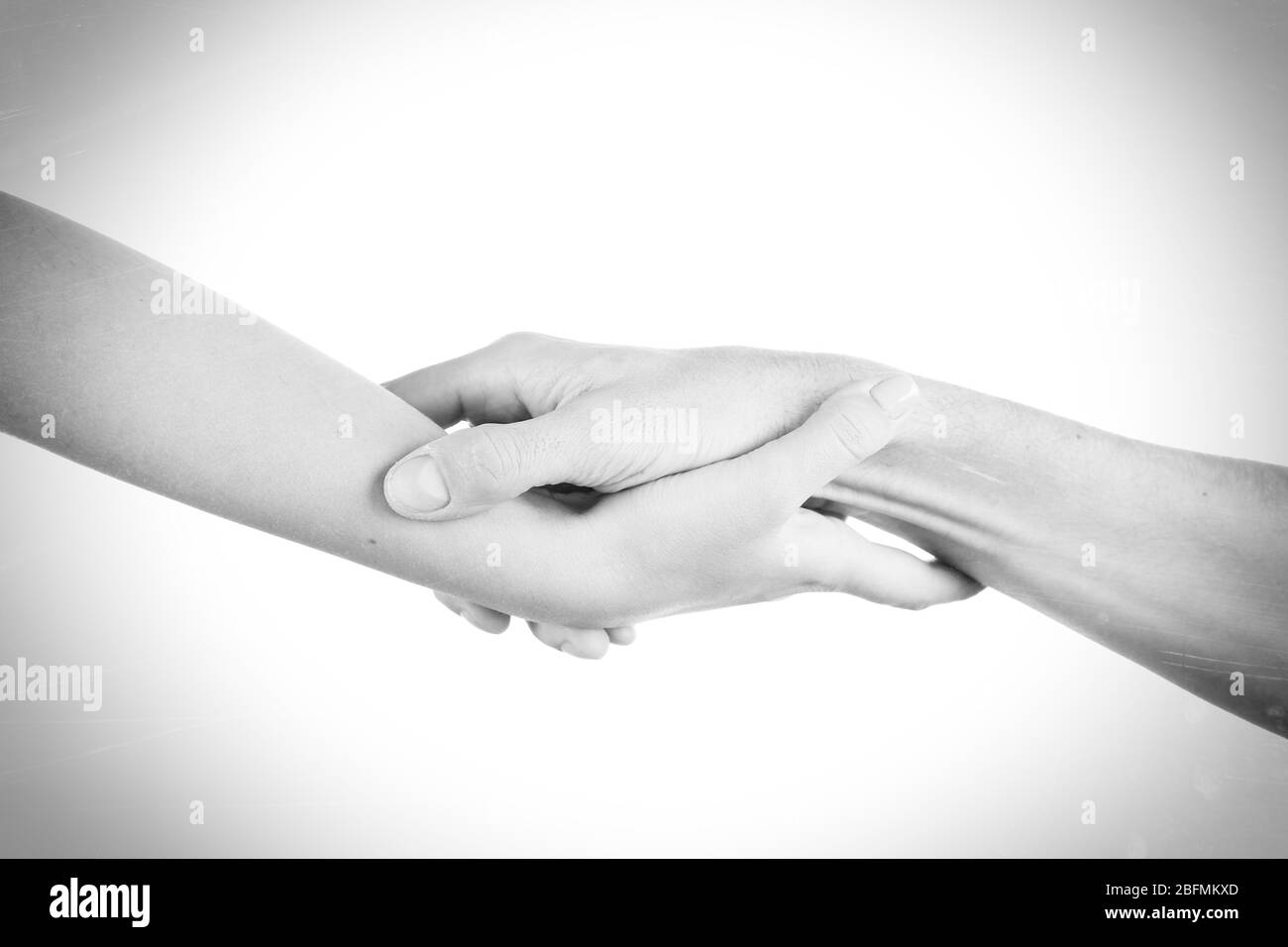 Two hands reaching toward each other. Helping concept. Vintage tone ...