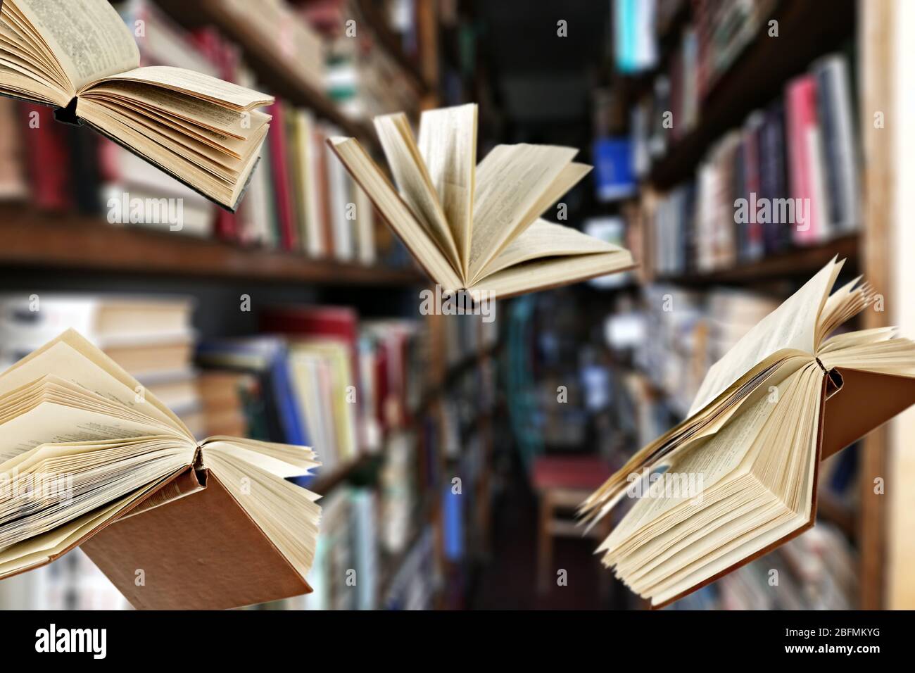 Flying books bookshelf hi-res stock photography and images - Alamy