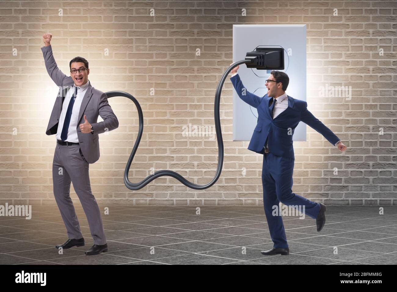 The businessman being powered by electricity and plug Stock Photo - Alamy