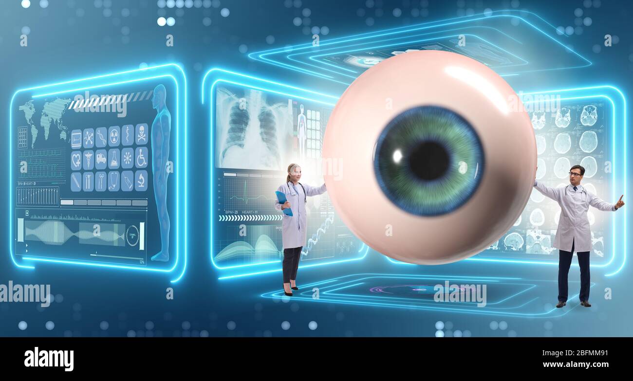 The doctor examining giant eye in medical concept Stock Photo - Alamy