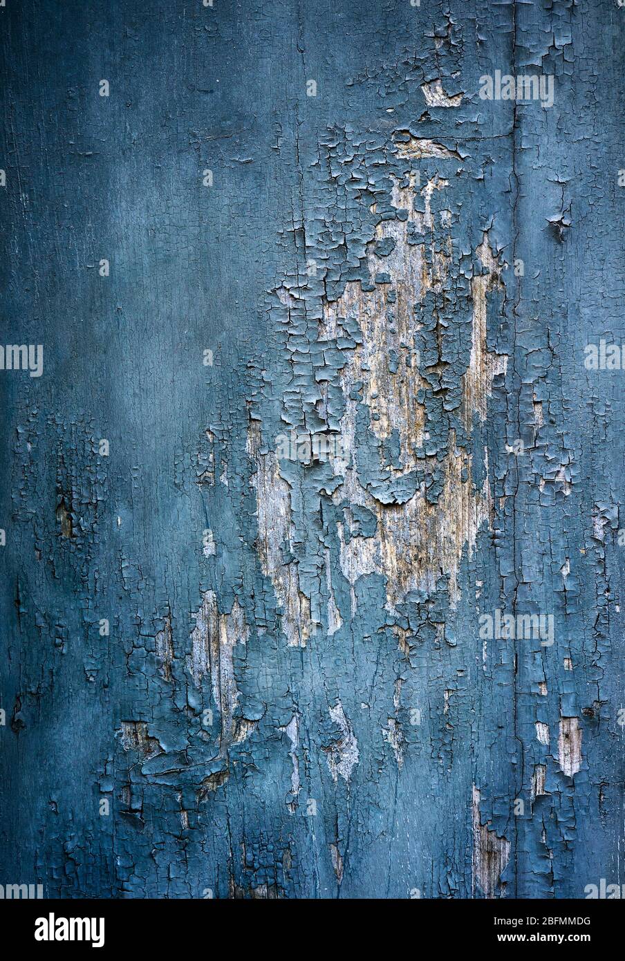 Paint is falling off the wooden door Stock Photo - Alamy