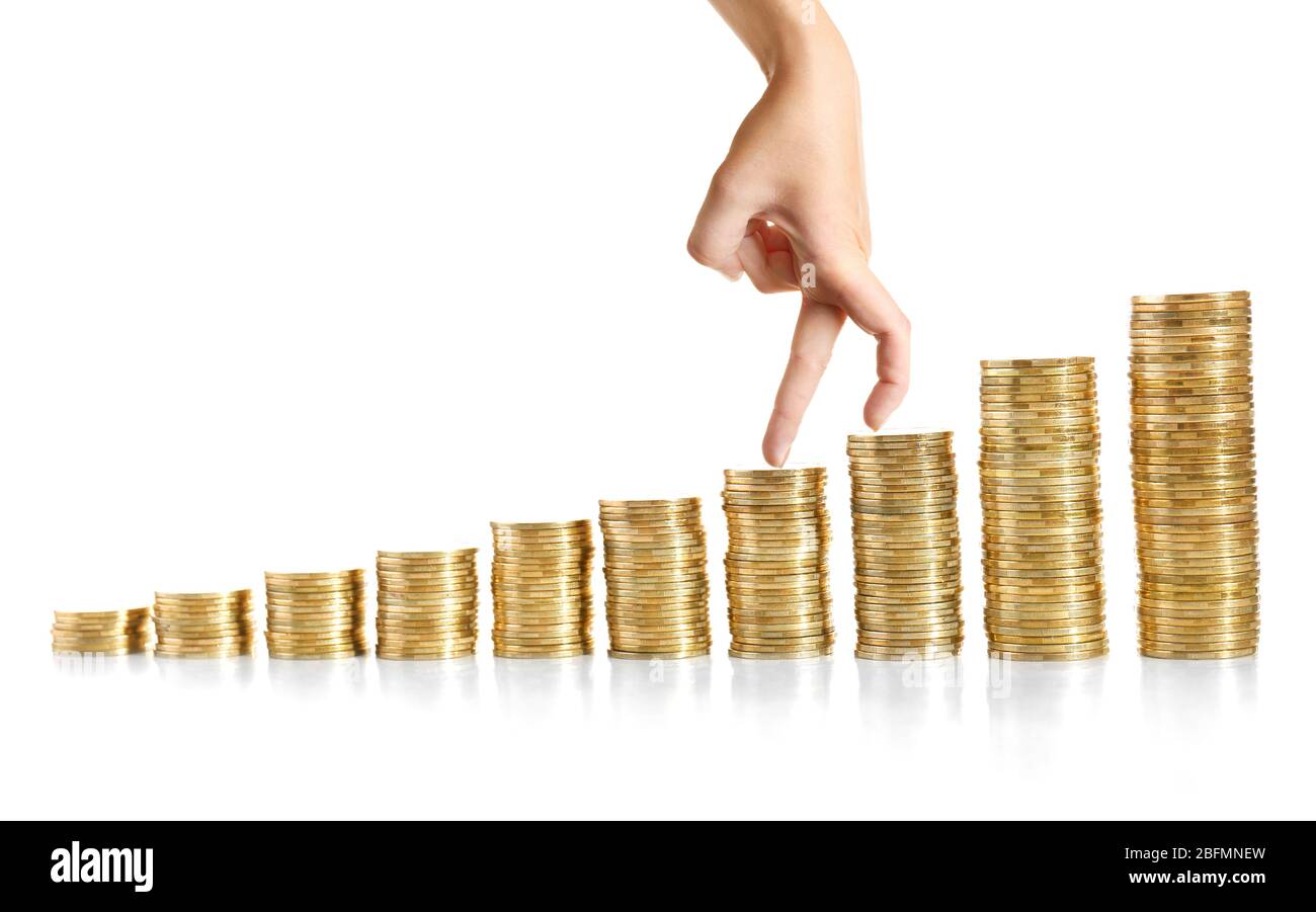 Financial success concept. Female fingers going up of coins, isolated ...