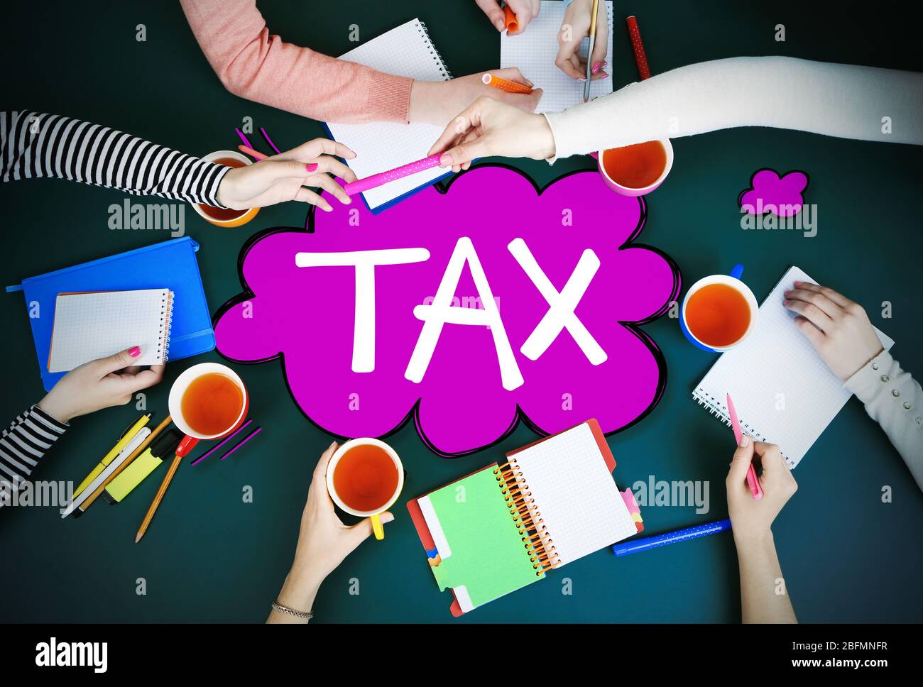 Tax concept. Creative team for work flow on blackboard background top ...