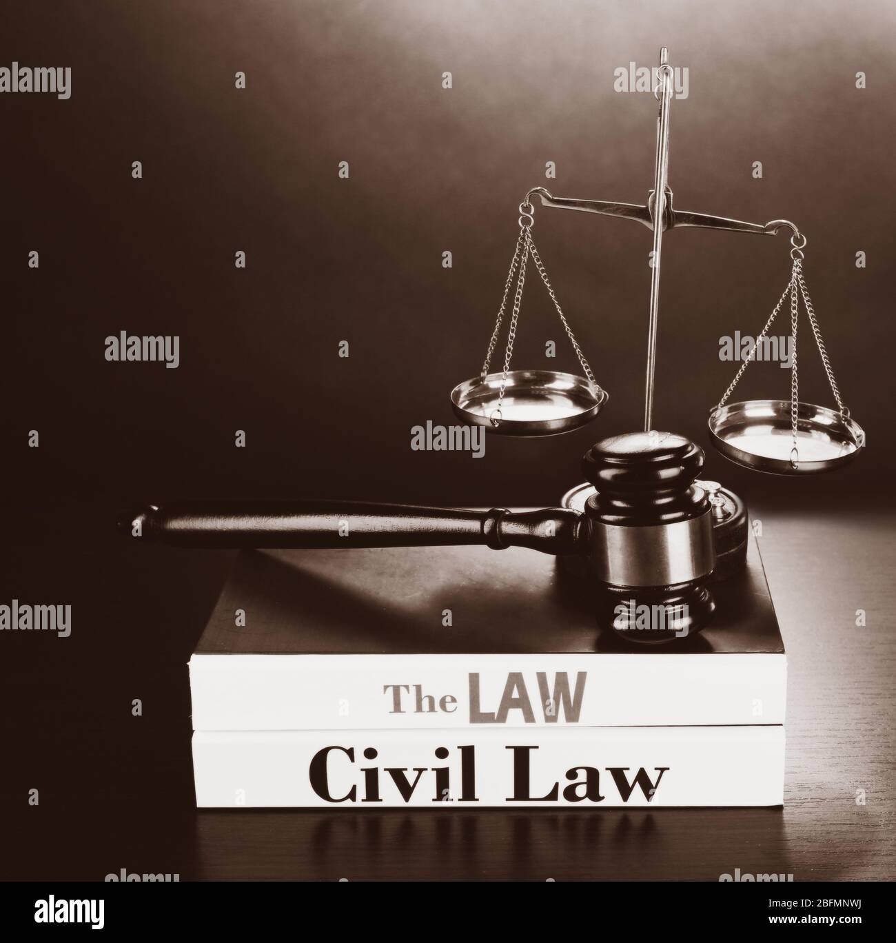 Books of Law on table on brown background. Retro stylization Stock ...