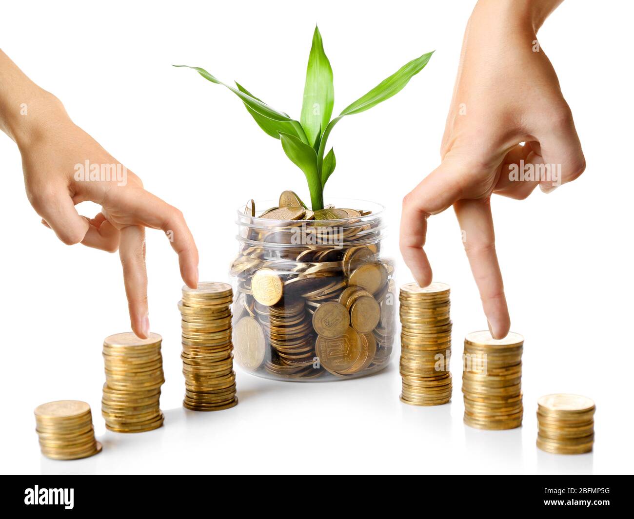 Financial success concept. Female fingers going up of coins, isolated ...