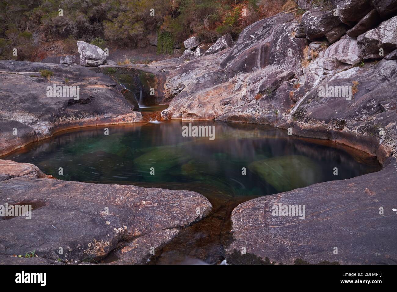 Natural pools formed by the erosion of the Pedras river, in Galicia ...