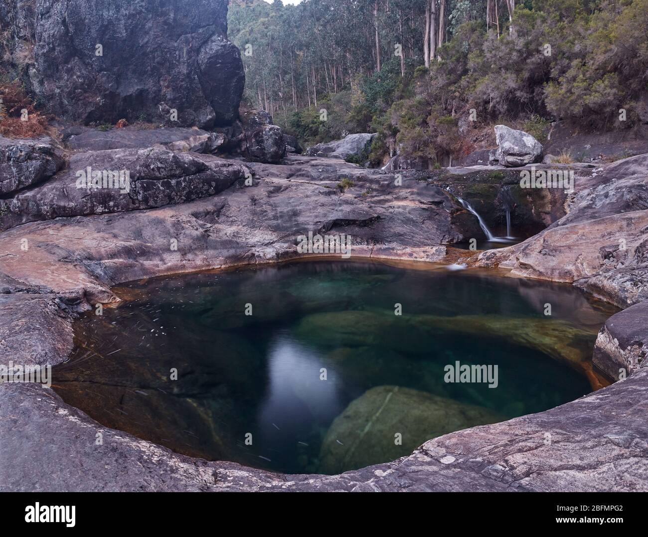 Natural pools formed by the erosion of the Pedras river, in Galicia ...