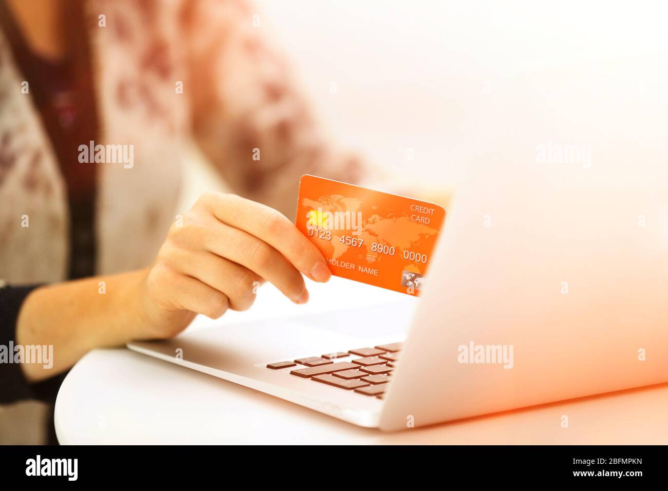 Female making online payment hi-res stock photography and images - Alamy