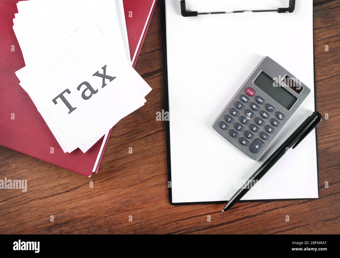 Taxes concept. Office tools on table Stock Photo - Alamy