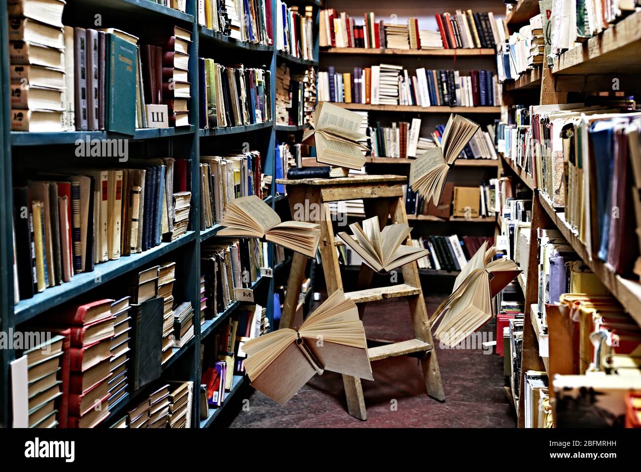 Flying books bookshelf High Resolution Stock Photography and Images - Alamy