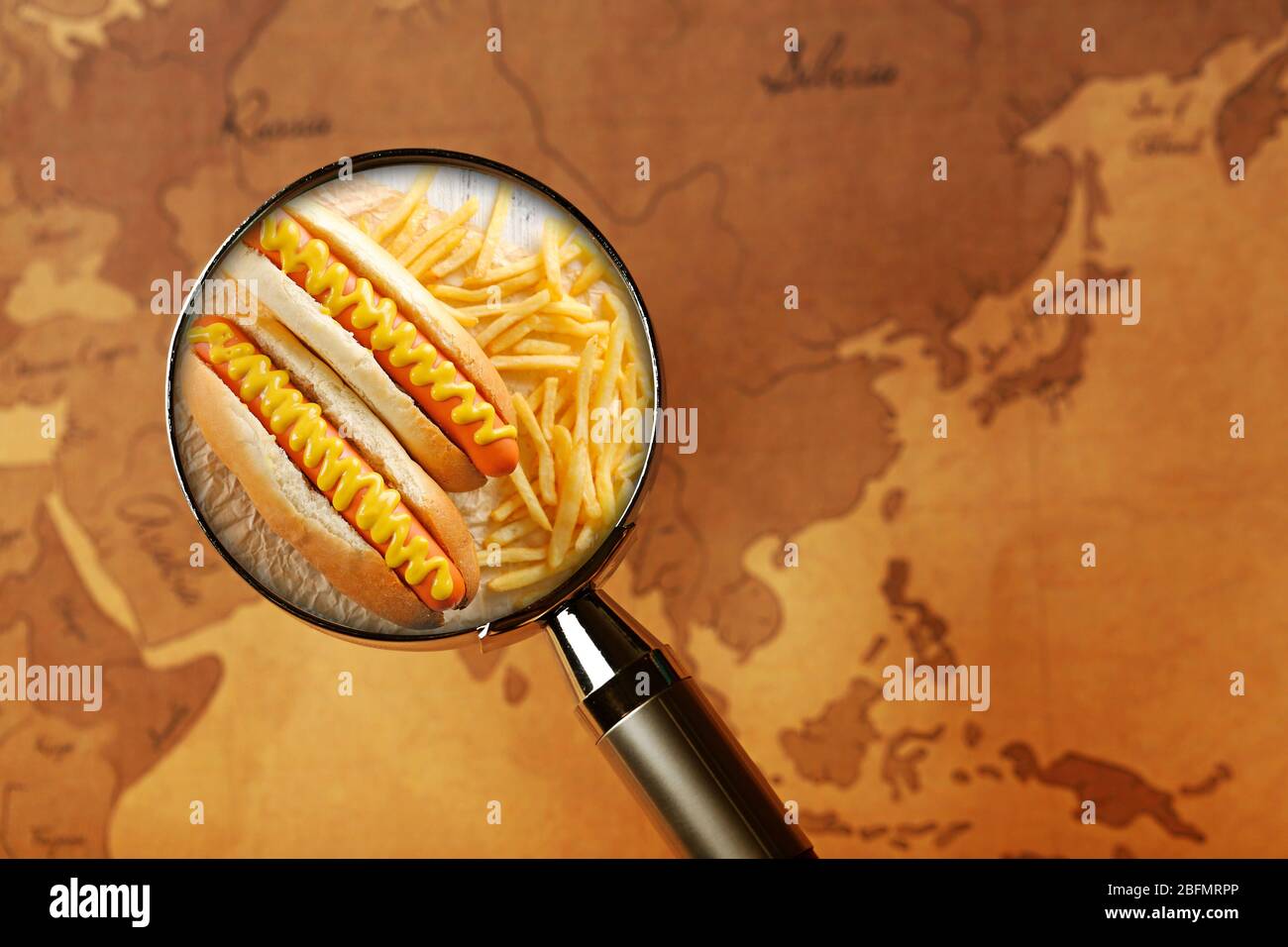 Popular food concept. Looking for fast food on world map Stock Photo ...