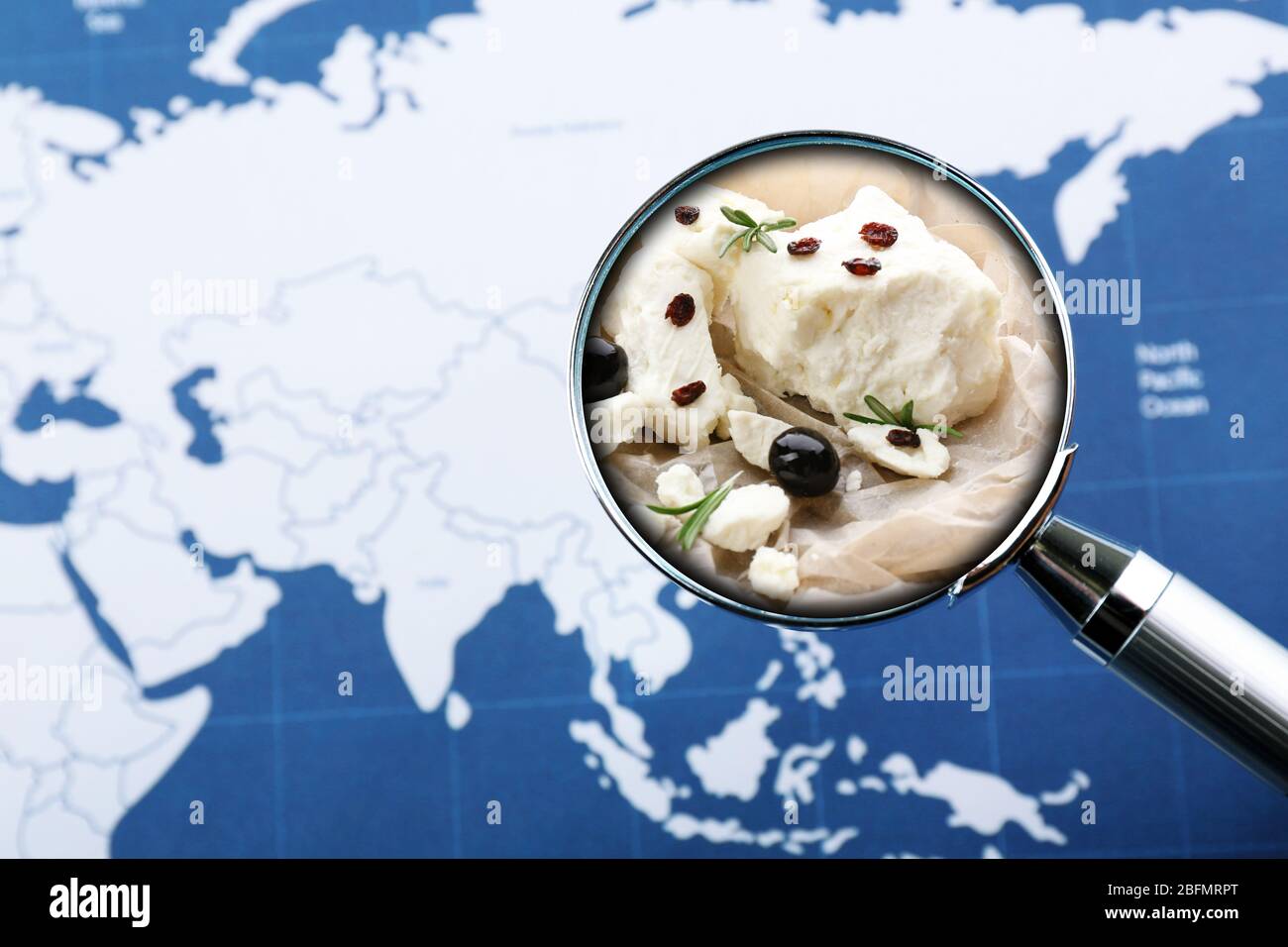 Popular food concept. Looking for feta cheese on world map Stock Photo ...