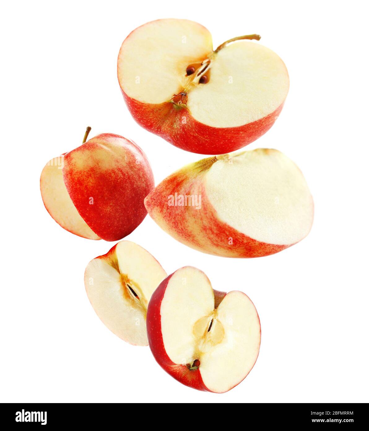 Falling ripe apples isolated on white Stock Photo - Alamy