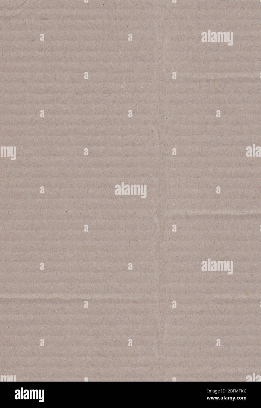 Gray cardboard closeup texture for background. Recycling gray paper ...