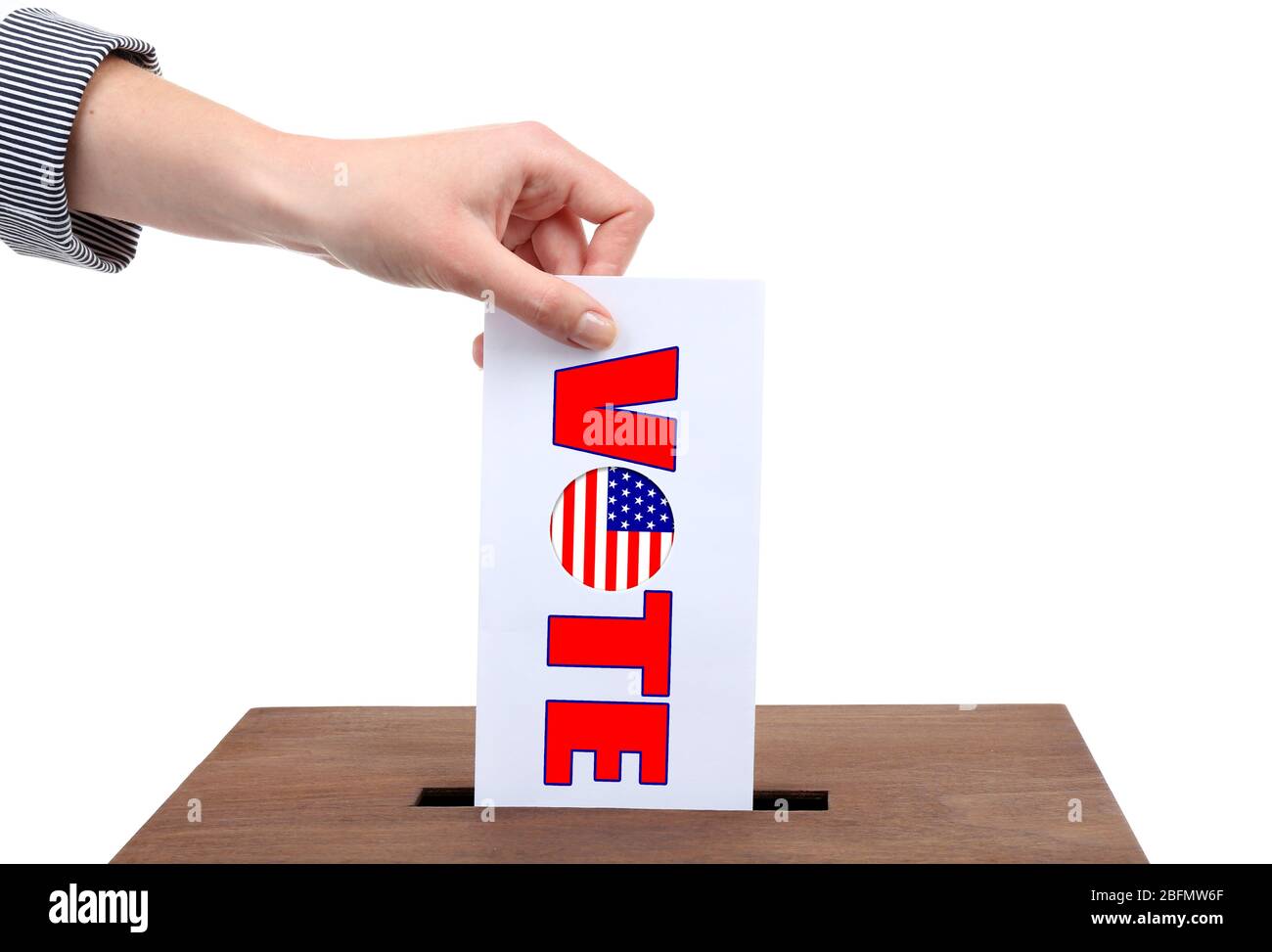 Human hand inserting bulletin in ballot box isolated on white Stock ...