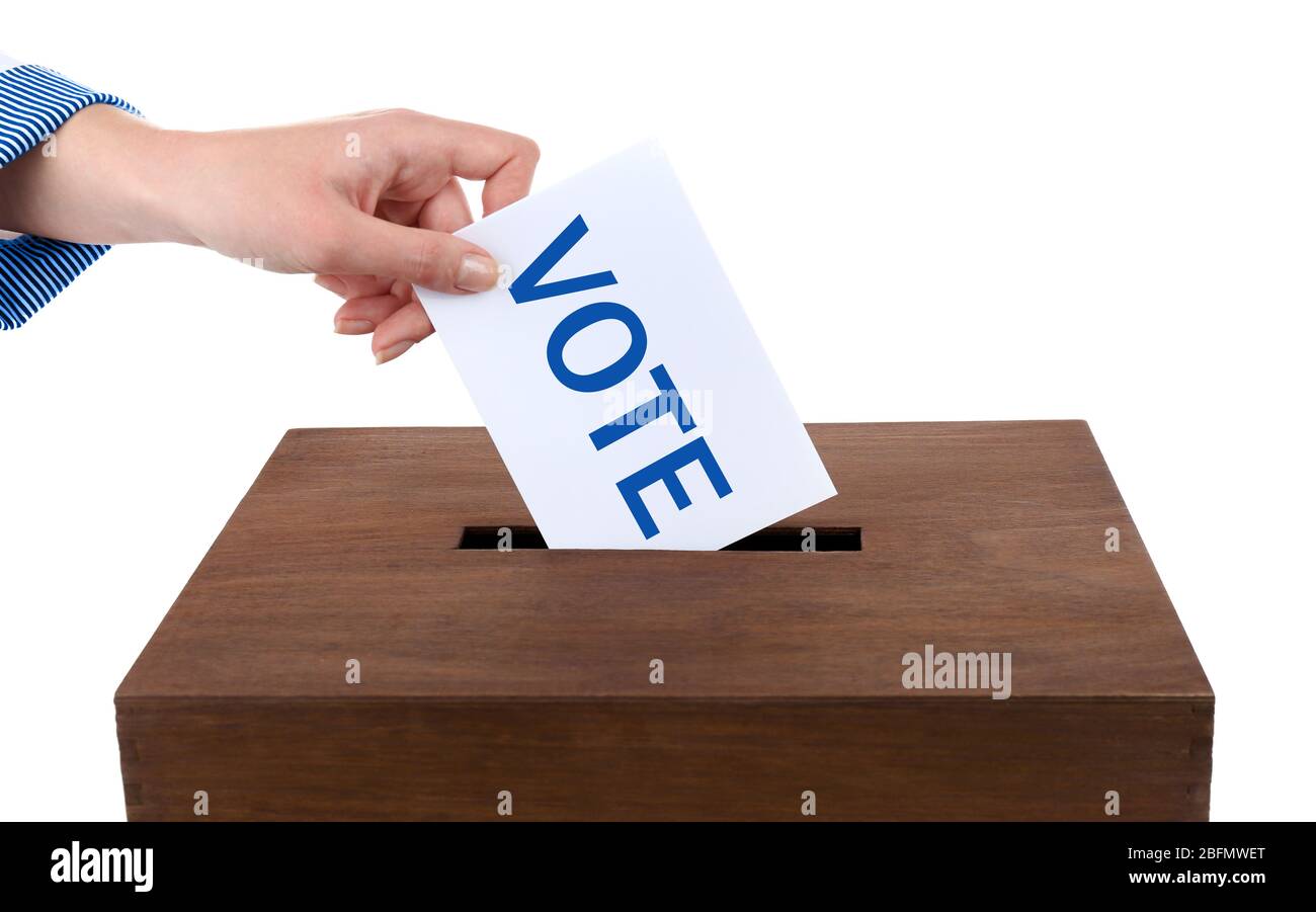 Human hand inserting bulletin in ballot box isolated on white Stock ...