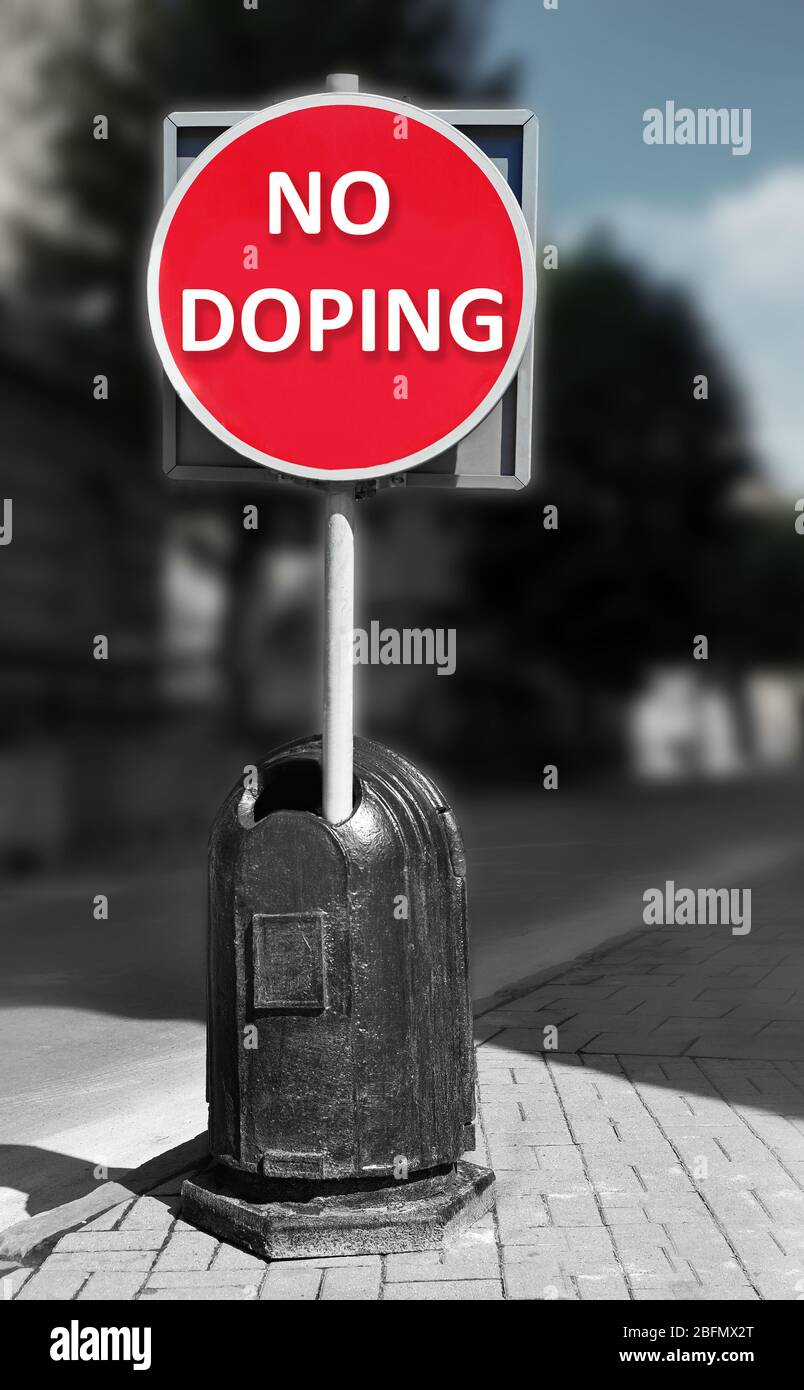 Stop doping concept. Sign NO DOPING on city street Stock Photo - Alamy