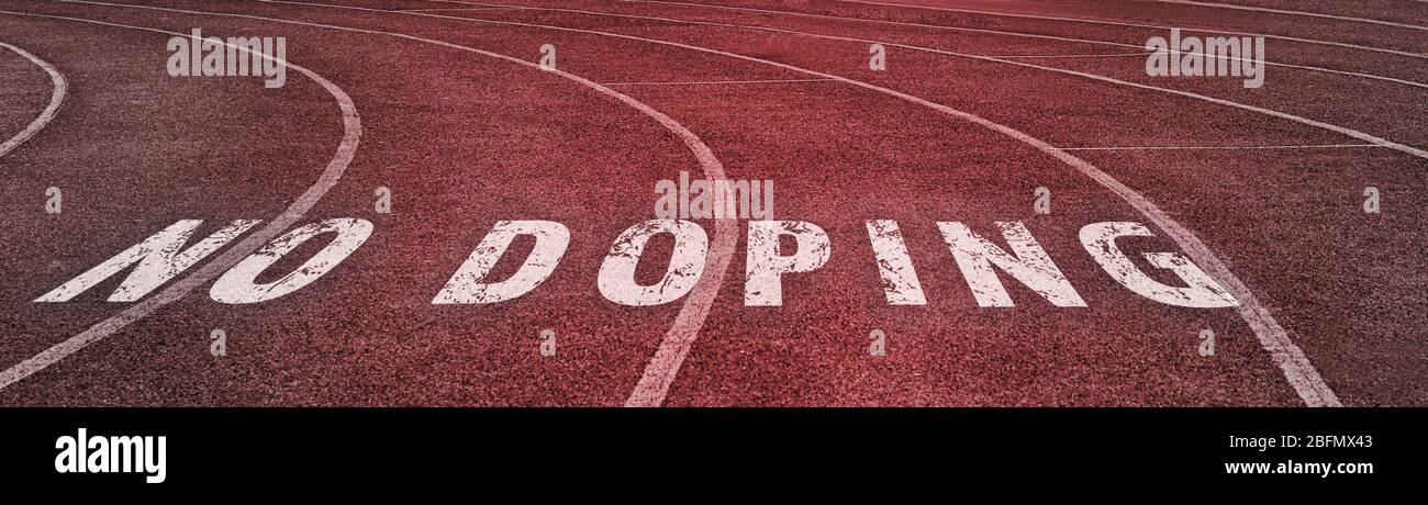 Stop doping concept. Text on running track Stock Photo - Alamy