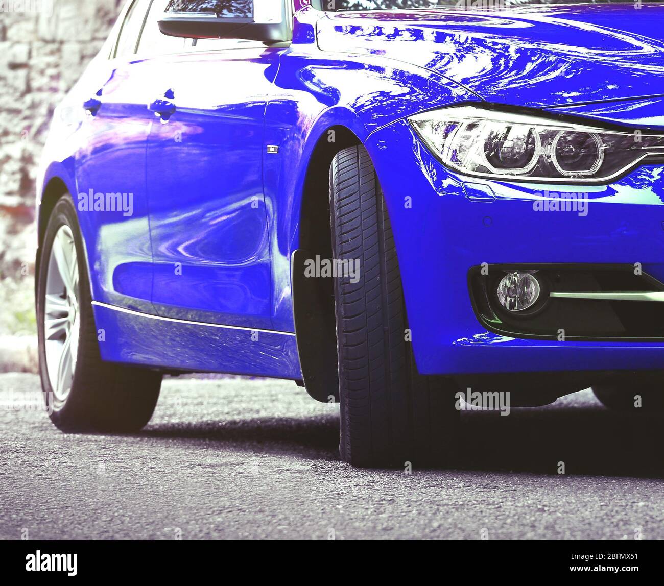 Blue car, outdoors Stock Photo - Alamy