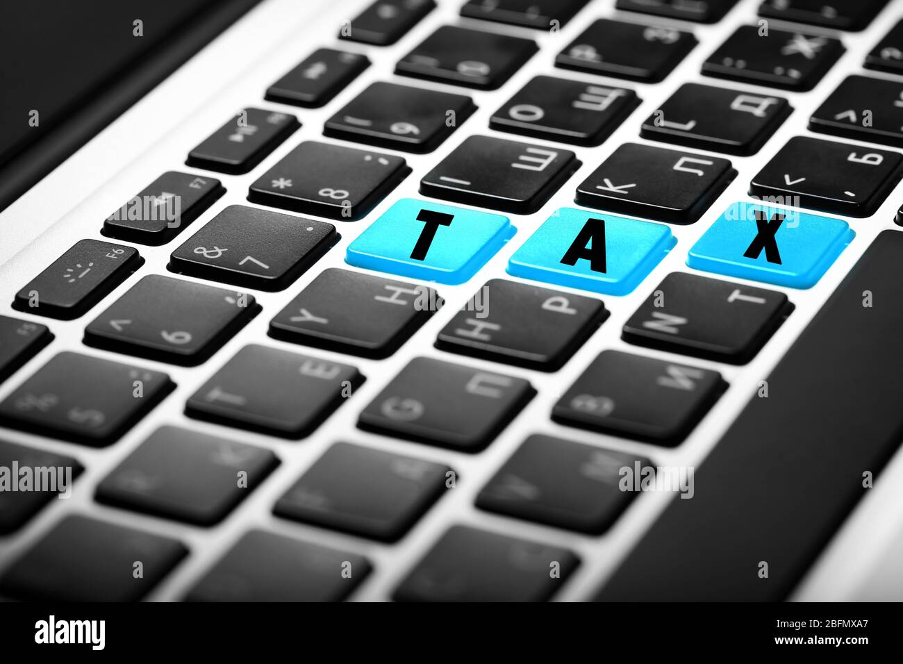 Tax Concept. Black keys of computer keyboard, closeup Stock Photo - Alamy